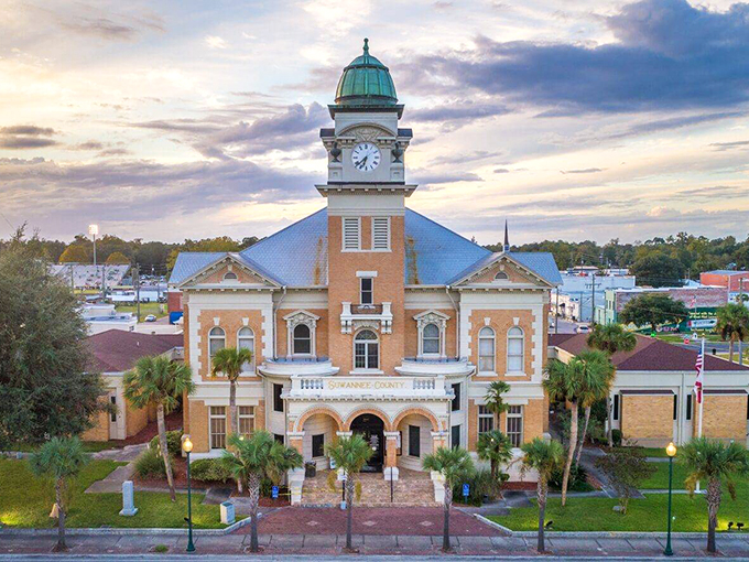 The historic courthouse anchors Live Oak's town square like a Southern belle holding court with timeless grace.