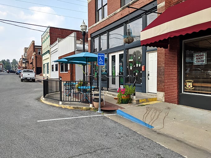 A wonderful spot with outdoor seating, this corner storefront is a perfect little urban oasis.