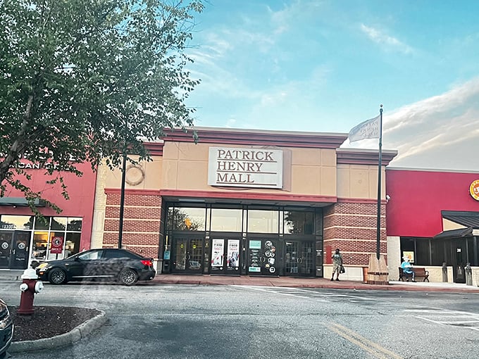 The classic brick exterior of Patrick Henry Mall blends Virginia tradition with modern shopping convenience in Newport News.