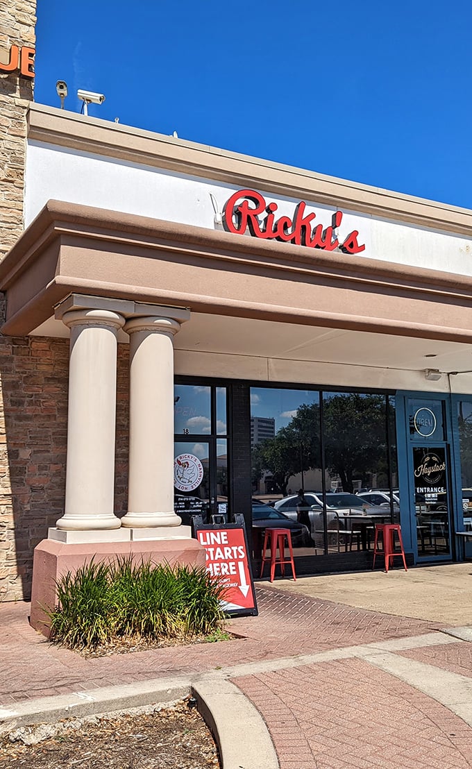 Ricky's entrance: Those columns aren't holding up just a building—they're supporting a temple of hot chicken worship.