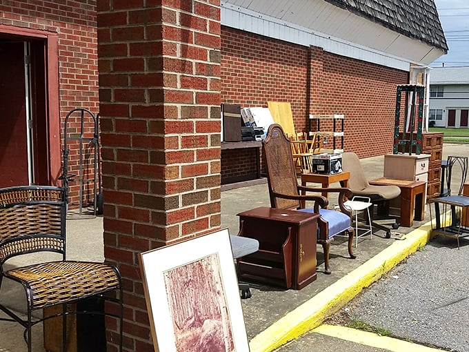 Under the covered walkway, furniture finds stay dry while shoppers stay happy. 