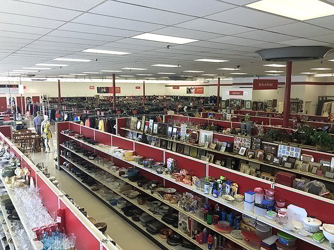 Organized aisles stretch endlessly, proving that thrift shopping can be both efficient and exciting.