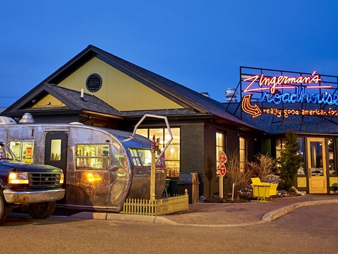 As evening falls, this yellow-trimmed Roadhouse glows with promise—of crispy skin, juicy meat, and "why-didn't-we-order-more" regret.