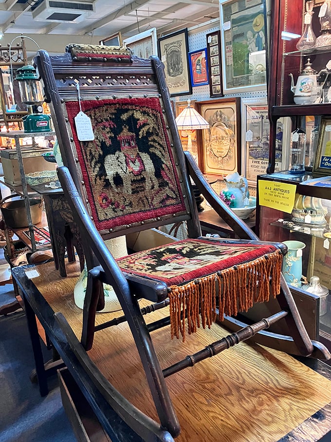 This Victorian rocking chair with its intricate tapestry isn't just furniture—it's a time machine with armrests and character.