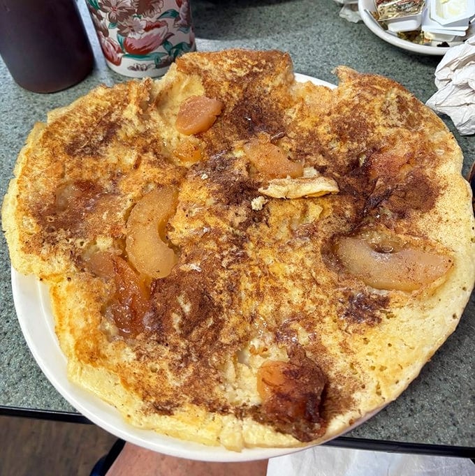 This apple cinnamon pancake isn't just breakfast—it's dessert with permission to eat it before noon. Your inner child is already applauding.