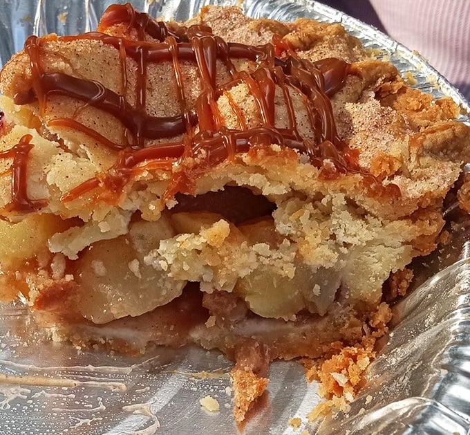 Not just apple pie, but apple pie with caramel drizzle! This isn't just dessert—it's what happens when someone's grandmother decides to show off a little.