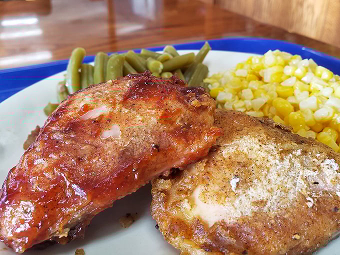 The kind of chicken that makes you question every other chicken you've ever eaten—crispy, seasoned skin giving way to juicy meat alongside farm-fresh sides.
