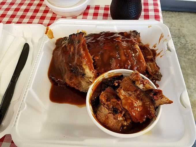 These ribs aren't just falling off the bone—they're practically jumping into your mouth, swimming in that glorious sauce.