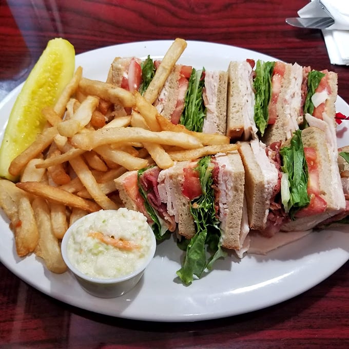 Club sandwiches: the skyscrapers of the sandwich world, where each perfectly cut triangle reveals layers of architectural deliciousness.