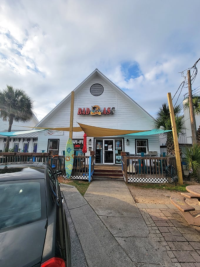 Bad Ass Coffee: The name promises attitude, but the wraparound porch delivers pure Southern hospitality—the perfect morning prescription for yesterday's Red Bar indulgences.