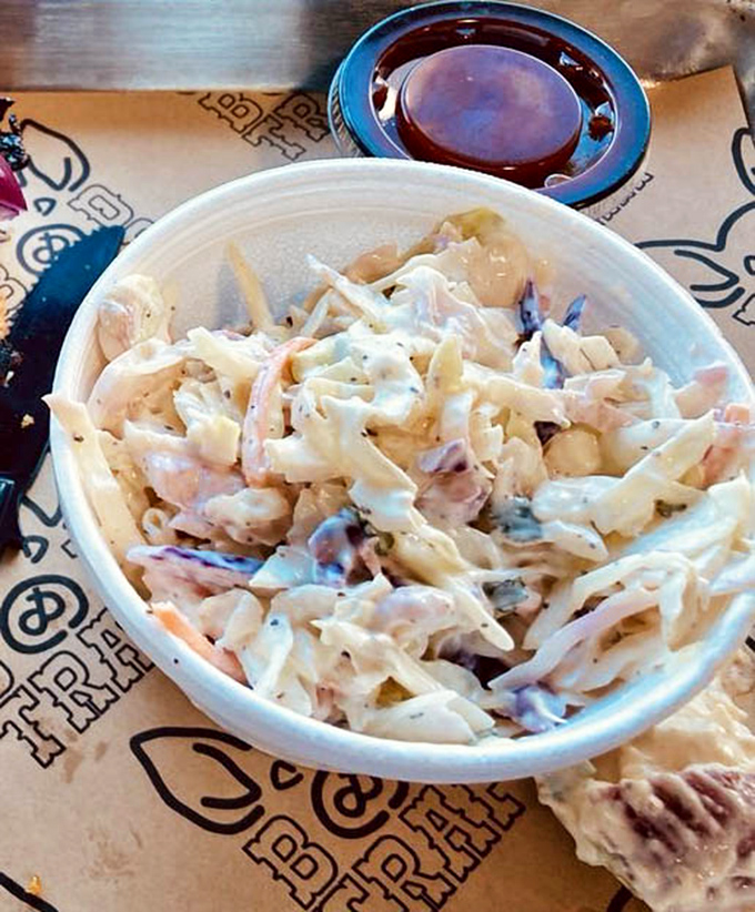 Creamy coleslaw that actually deserves a place at the barbecue table. This isn't your bland, mayo-drenched afterthought – it's a crucial player in the flavor symphony.