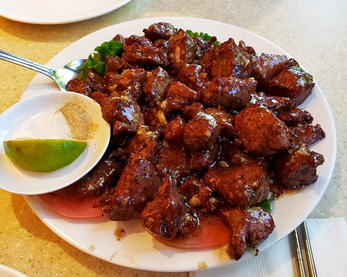 The Bo Luc Lac (Shaking Beef) arrives caramelized to perfection, with a lime-pepper dipping sauce that makes your mouth do a happy dance.