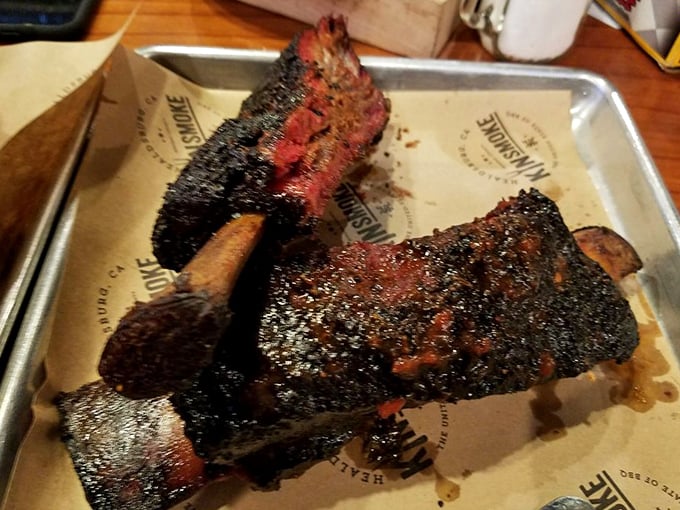 These beef ribs have the kind of bark that doesn't just announce itself – it delivers a TED talk on the art of smoking meat.