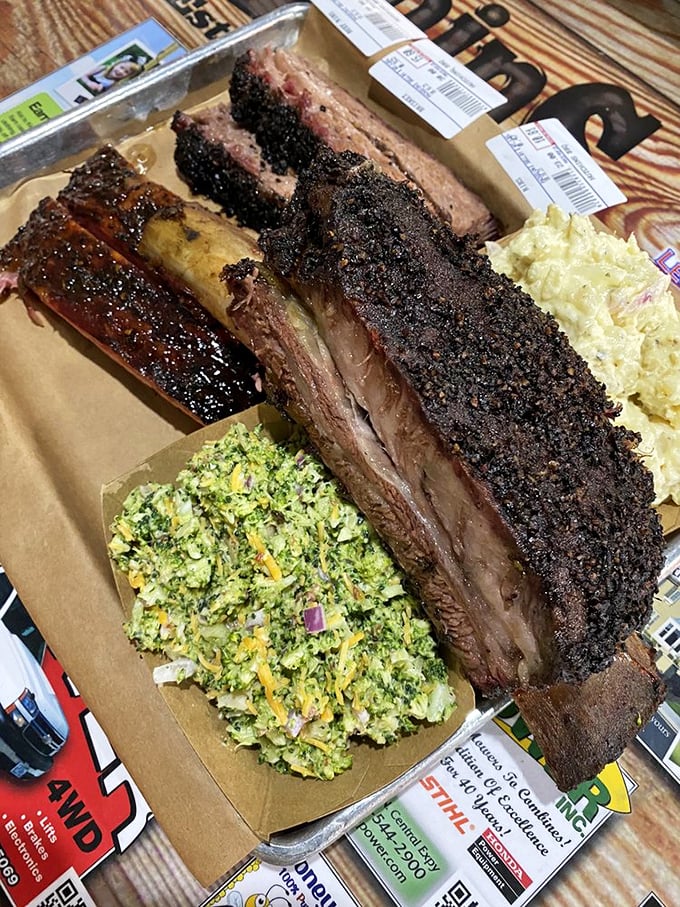 Beef ribs with broccoli slaw—nature's perfect balance. One bite of this dinosaur bone will make you understand why cavemen were so happy.