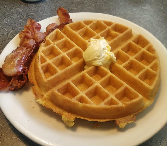 This waffle doesn't need a passport to be internationally renowned—golden, crisp, with butter melting into each perfect square like a warm Arizona sunrise.