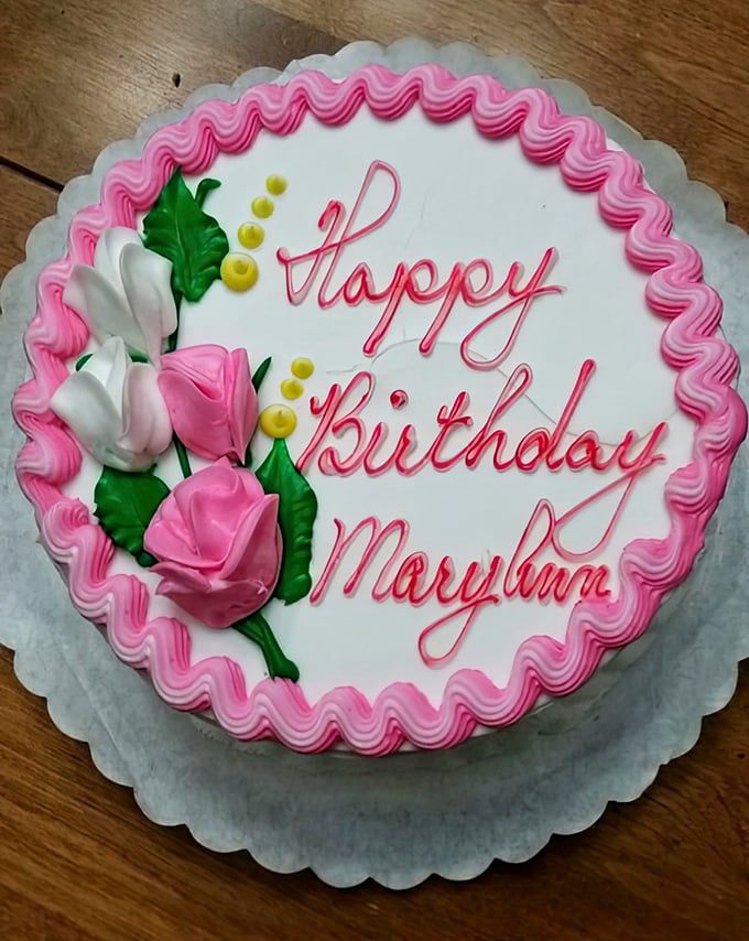 Pink roses and perfect piping – this birthday cake means business, the happy kind.