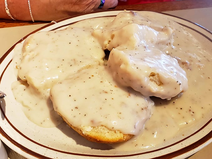 Southern comfort in its purest form—biscuits swimming in creamy gravy. Not diet food, but definitely soul food.