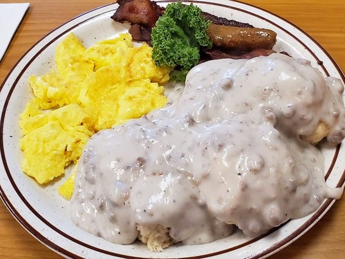 Biscuits and gravy with enough pepper specks to prove it wasn't poured from a packet. Comfort food that hugs your insides.