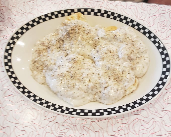 Biscuits smothered in pepper-flecked gravy—a dish so comforting it's like getting a hug from your grandmother, if your grandmother was an exceptional cook.