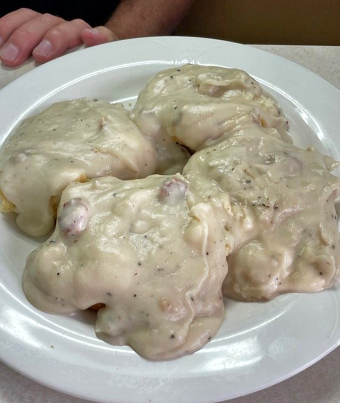 Biscuits drowning happily in creamy sausage gravy. If clouds were made of flour and butter, this is what they'd look like from heaven.