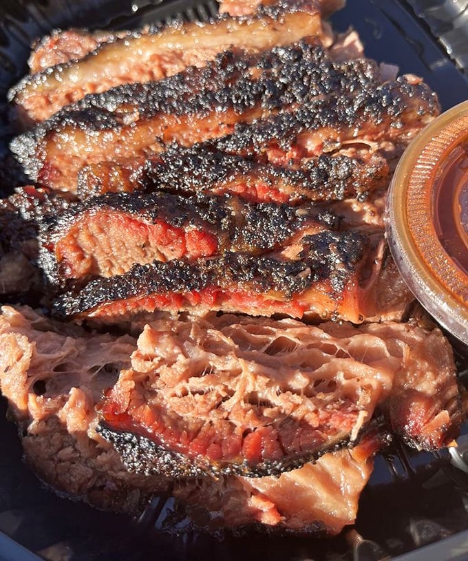 Brisket so perfectly smoked it makes Texans nervous. That bark, that smoke ring, that tenderness—it's the holy trinity of barbecue achievement.