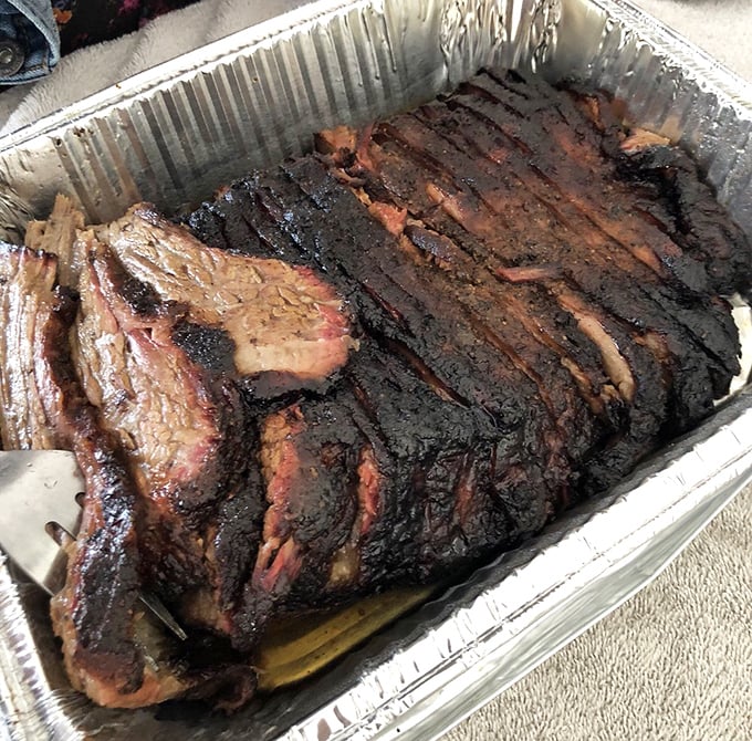 Brisket so beautiful it deserves its own album cover. The bark, the smoke ring, the glistening fat – this is meat transformed into art.