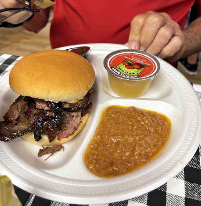 The brisket sandwich arrives like a meaty meteor from barbecue heaven, with Brunswick stew that could make a Texan tip their hat to Georgia.