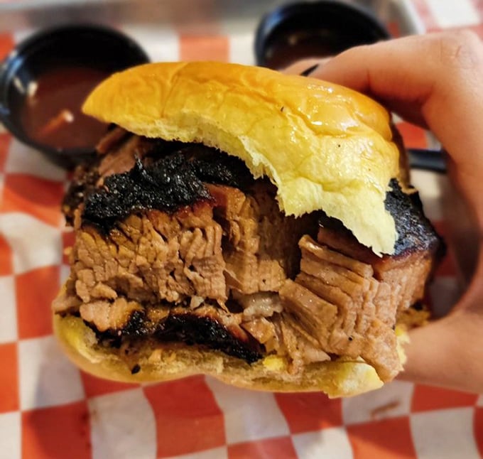 The brisket sandwich that ruins all future sandwiches. That smoke ring isn't just for show—it's a flavor halo sent from barbecue heaven.