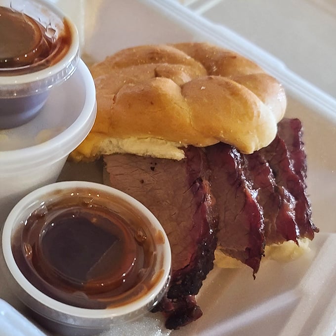 That brisket sandwich is what happens when comfort food gets a smoky makeover – pure bliss.