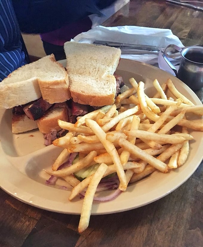 A brisket sandwich that doesn't need fancy frills—just quality meat, bread that knows its supporting role, and fries standing by for backup.