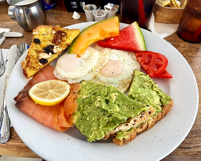 A breakfast plate that answers the eternal question: "Why choose one thing when you can have it all?" Smoked salmon, eggs, and avocado toast—the breakfast trifecta.