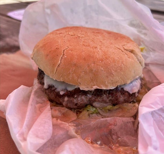 The New Pass burger – where beef meets destiny on a perfectly toasted bun. No Instagram filter required.