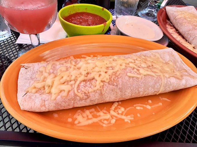 Behold the burrito – a tortilla-wrapped miracle that somehow manages to contain more filling than should be physically possible.