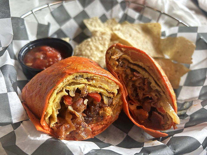 This burrito doesn't just contain breakfast—it revolutionizes it. Wrapped in an orange tortilla like a delicious sunrise you can actually bite into.