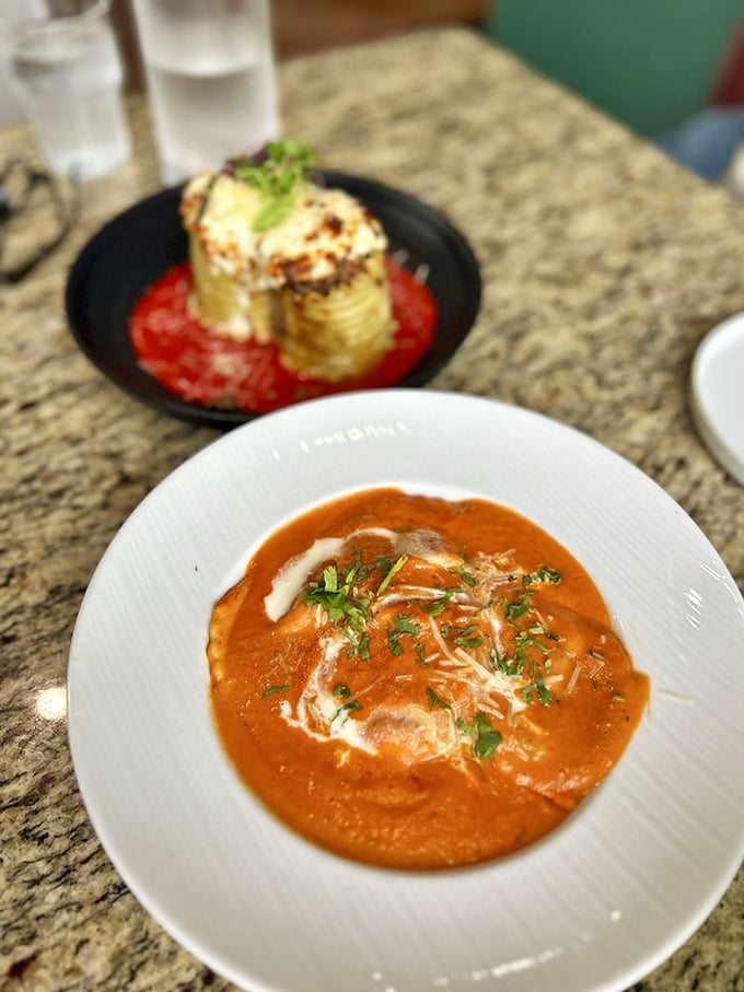 Butter chicken meets Italian ravioli in this mind-blowing fusion dish. The creamy orange sauce whispers sweet nothings to your taste buds while the pasta nods approvingly.
