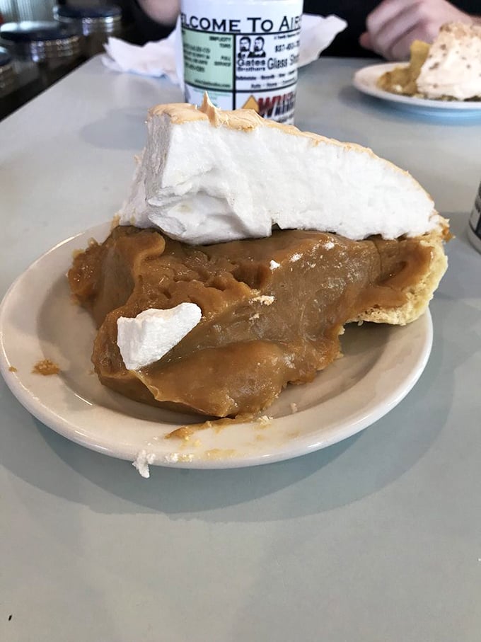 Butterscotch pie that makes time stand still. That meringue isn't just a topping—it's a cloud you could happily float away on.