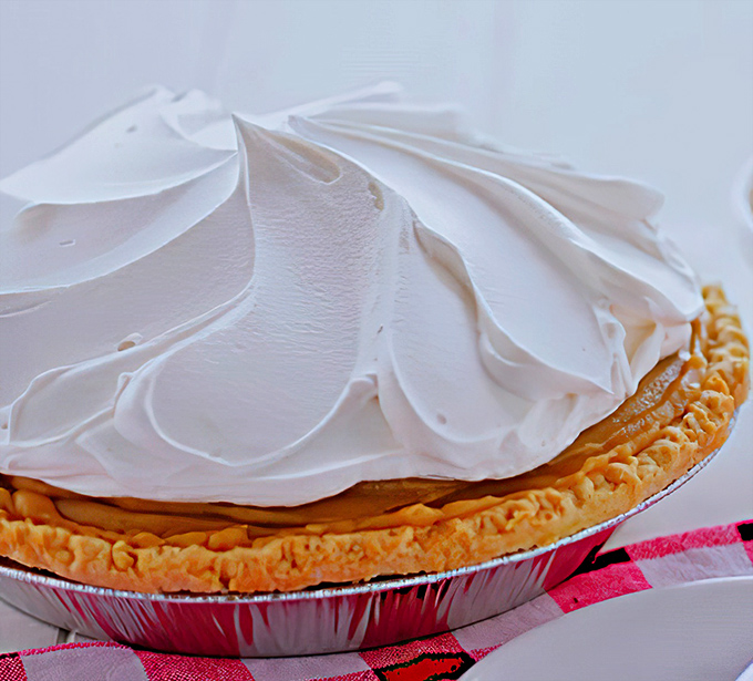 Cloud-like meringue billows over butterscotch filling—this pie doesn't just satisfy sweet cravings, it fulfills dreams you didn't know you had.