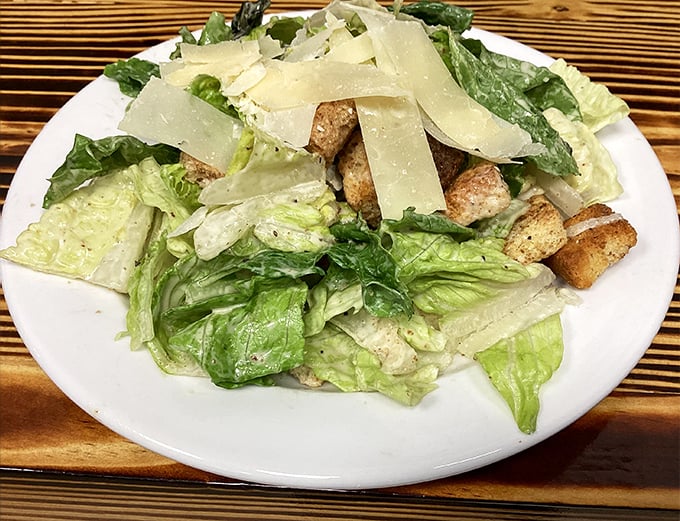 Caesar salad done right is like a good marriage – familiar yet exciting, with each ingredient playing its part without overshadowing the others.