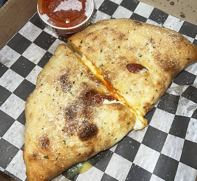 The calzone: Italy's answer to the Hot Pocket, if Hot Pockets went to culinary school in Naples and graduated with honors.