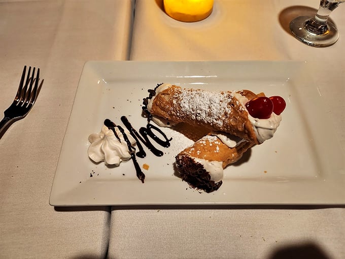 Dessert architecture at its finest—a cannoli that balances sweetness and texture like a tightrope walker with nerves of steel.