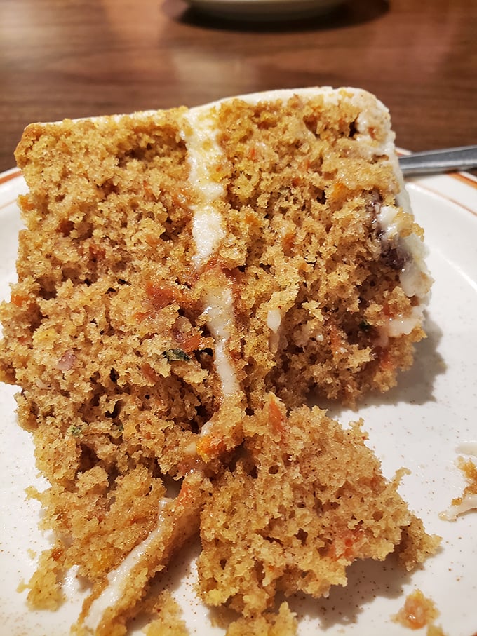 Carrot cake that doesn't need fancy piping or edible flowers – just moist, spiced perfection with cream cheese frosting that would make your grandmother weep with joy.