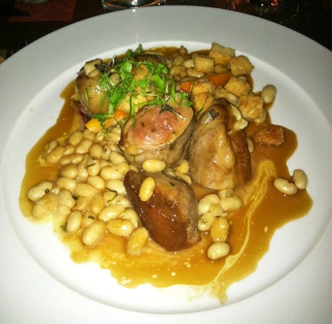 This cassoulet doesn't just warm your stomach—it hugs your soul. Beans and meat in perfect harmony, like Sinatra and a good microphone.