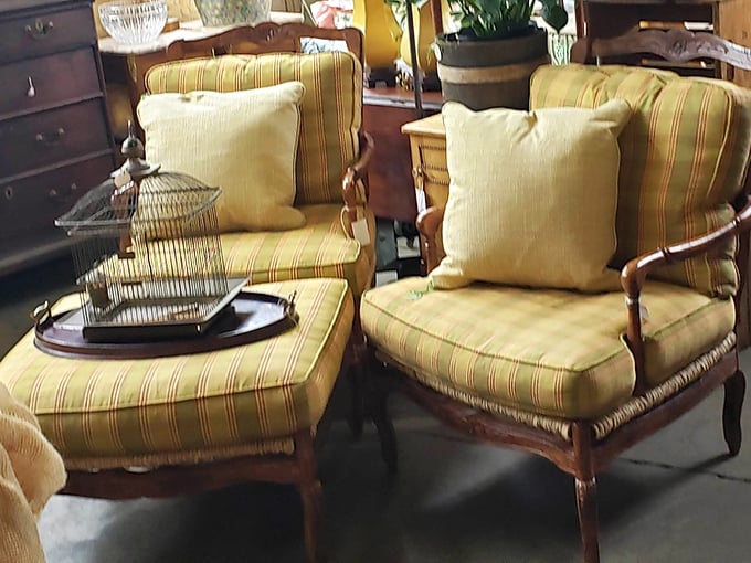 Not your average IKEA seating arrangement. These elegant chairs with striped upholstery are waiting for someone to recreate their grandmother's living room. 