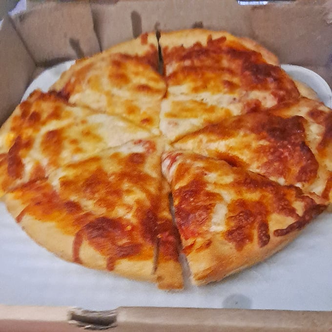 A cheese pizza so perfectly executed it reminds you why classics become classics in the first place. Simple doesn't mean boring.