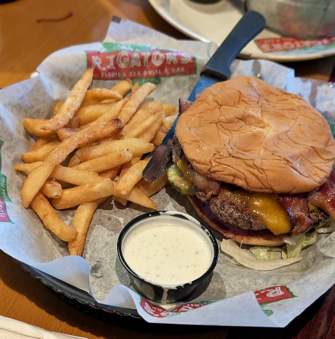 This isn't just a burger—it's a towering monument to beef, cheese, and the American dream, served with a side of perfectly golden fries.