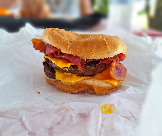 This isn't some fancy gastropub's "deconstructed" burger concept. It's the real deal—melty cheese, crisp bacon, and beef that reminds you why classics became classics.