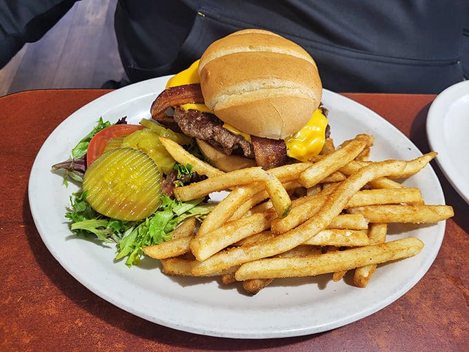The cheeseburger and fries combo – America's contribution to global happiness, executed with the confidence of decades of practice.