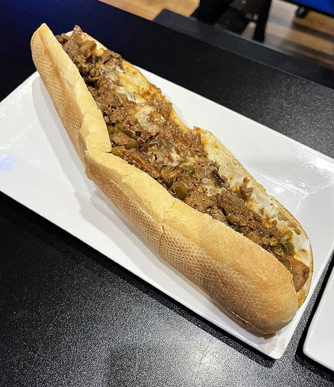 A proper cheesesteak should require both hands and several napkins – this beauty checks all the boxes of Philadelphia-inspired perfection.