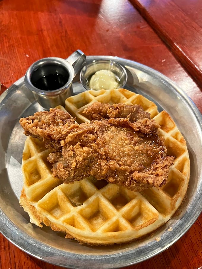 The chicken and waffle alliance proves that opposites don't just attract—they create culinary magic. Sweet meets savory in perfect harmony.