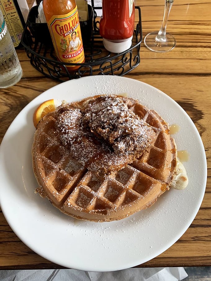 This Belgian waffle topped with powdered sugar and syrup is the breakfast equivalent of finding an extra $20 in your pocket – an unexpected joy.